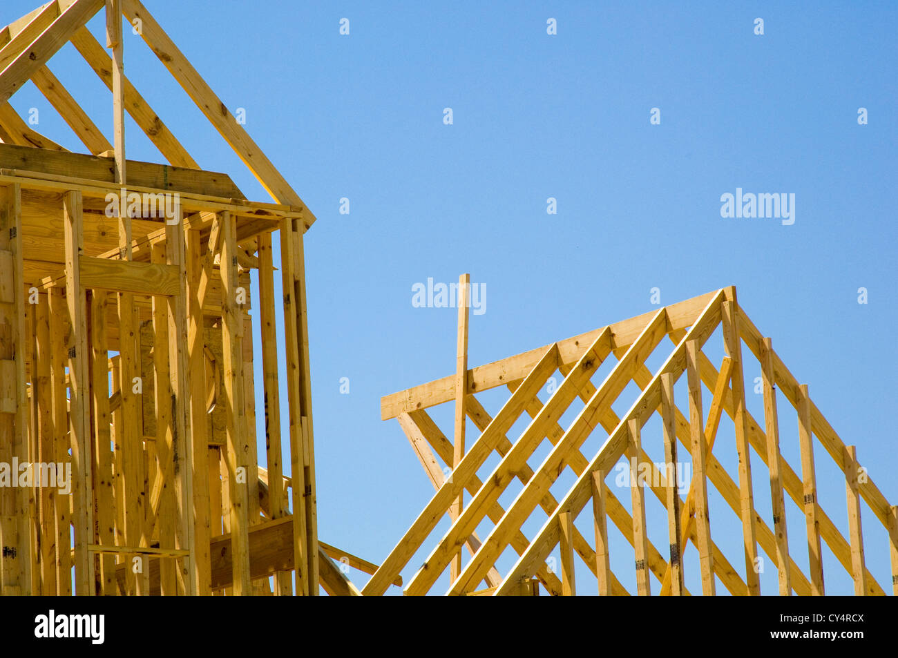 House under construction against blue sky Stock Photo - Alamy