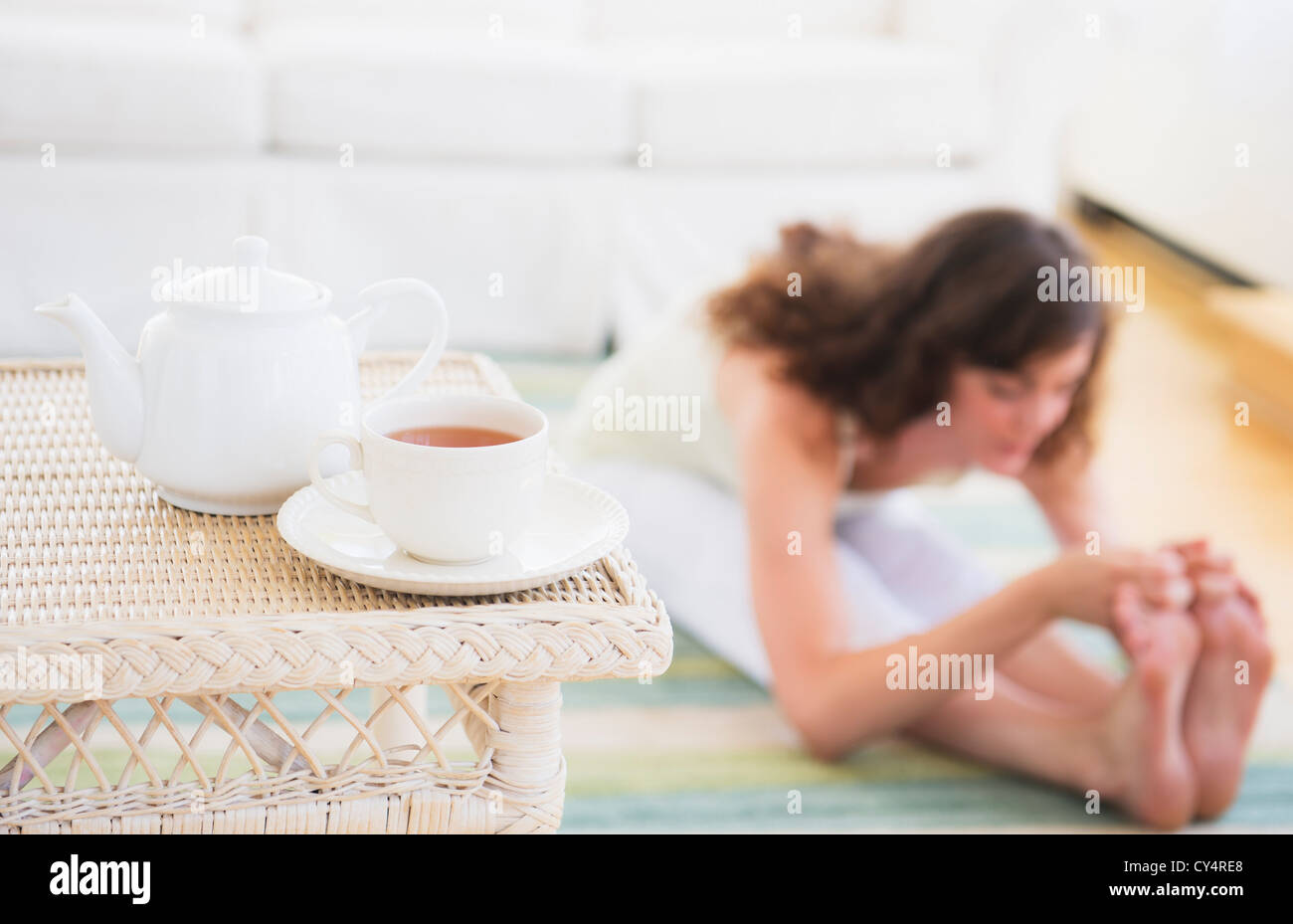 Young woman exercising at home Stock Photo - Alamy