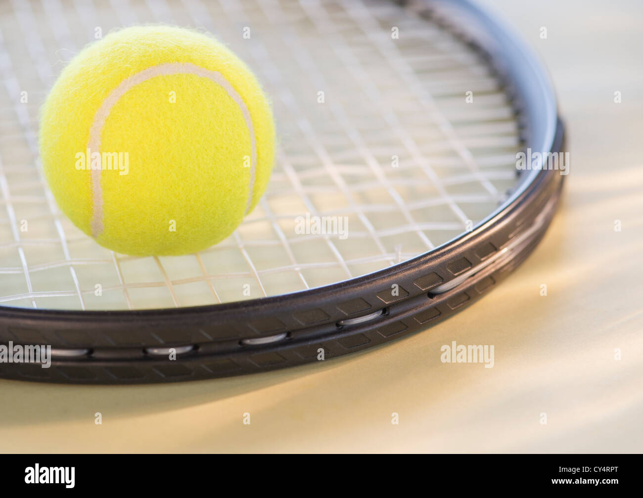Studio Shot of tennis racket with ball Stock Photo - Alamy