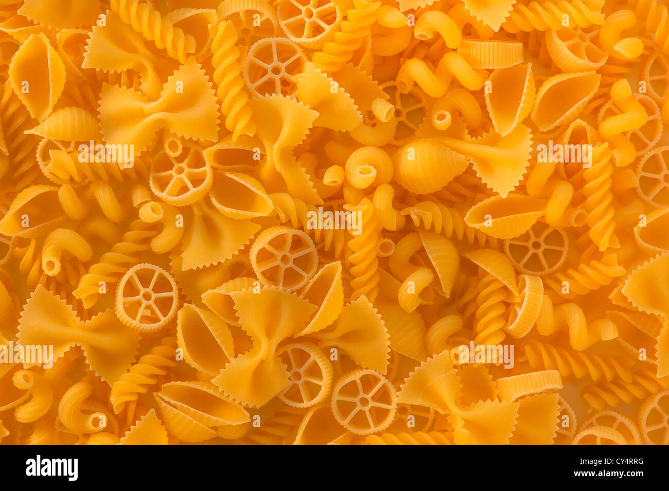 Variety of yellow pasta Stock Photo - Alamy