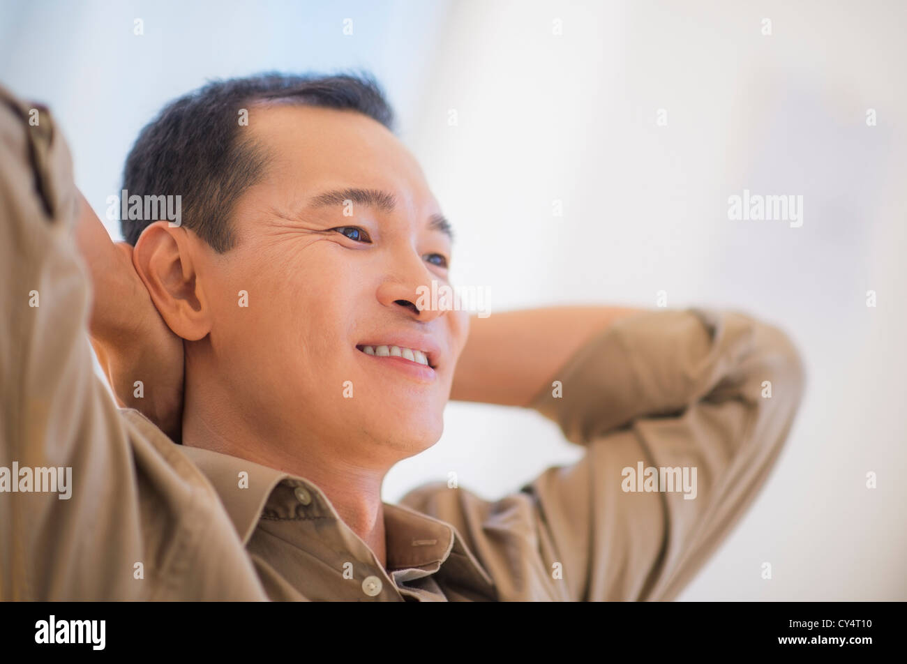 Man hands behind back side view hi-res stock photography and images - Alamy