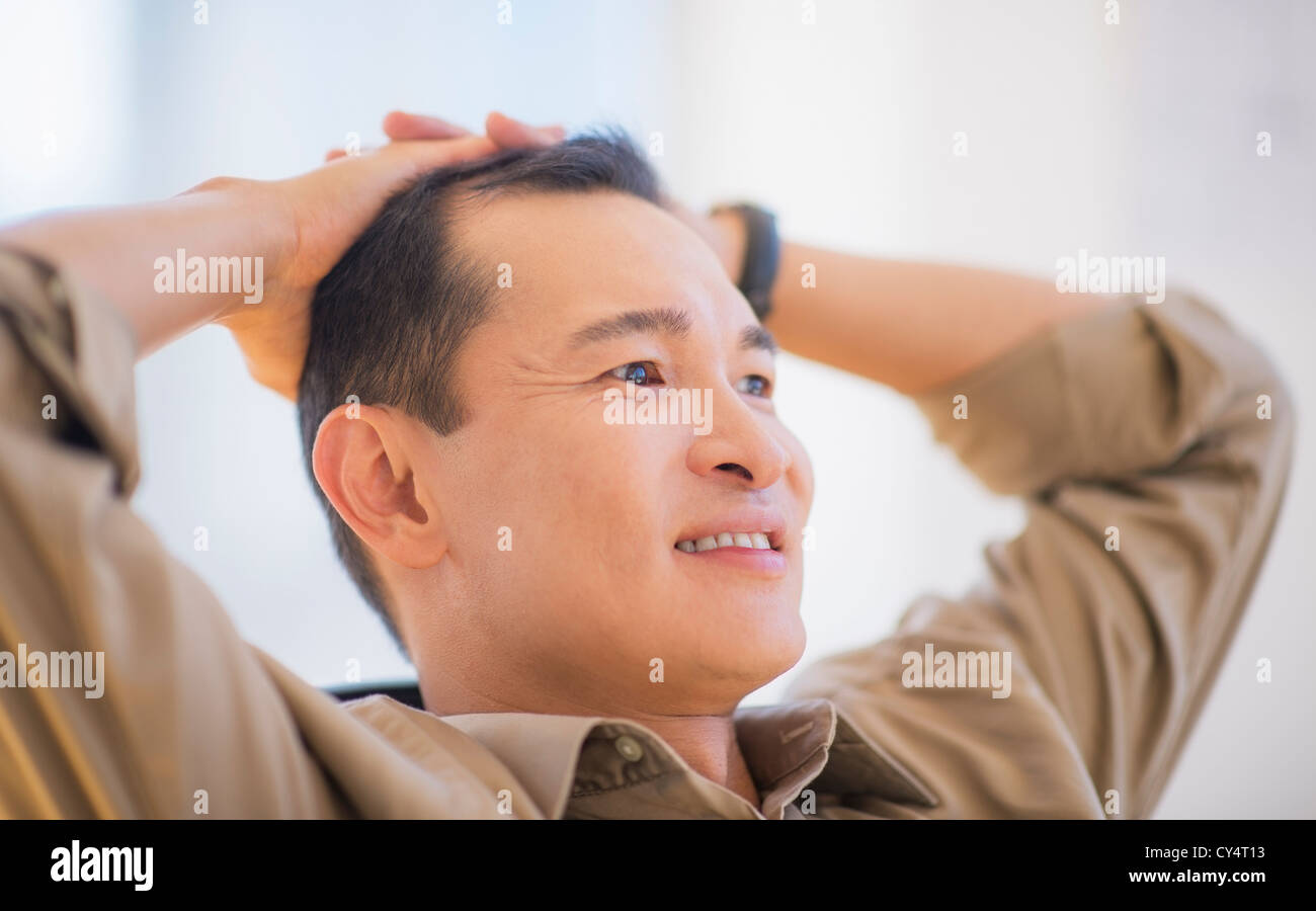 Man hands behind back side view hi-res stock photography and images - Alamy