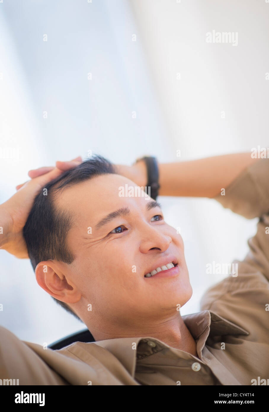 Man hands behind back side view hi-res stock photography and images - Alamy