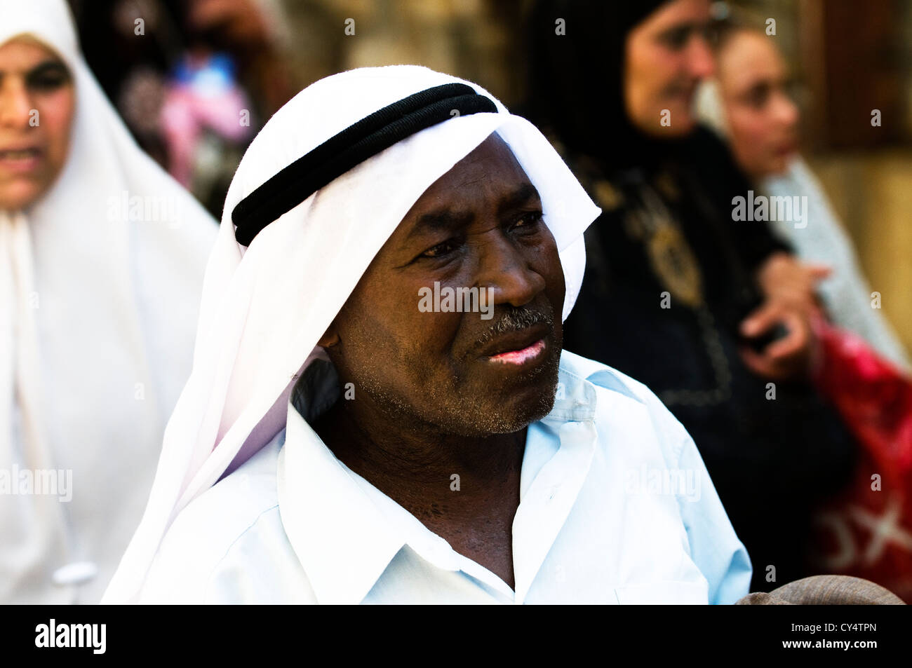 An Arab Palestinian man walking through the narrow streets of the Musim ...