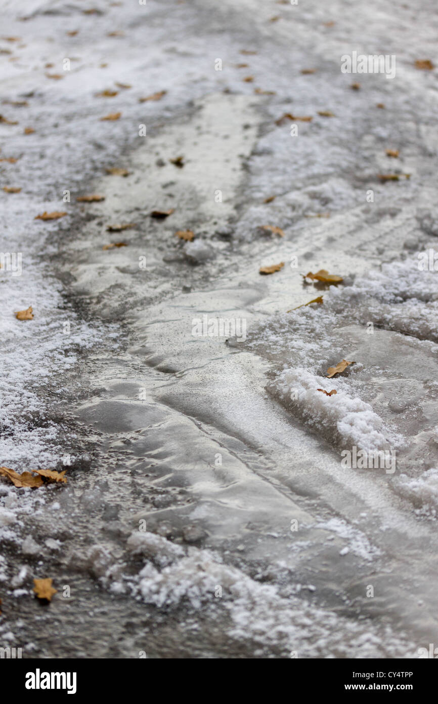 Ice On Road Stock Photo - Alamy