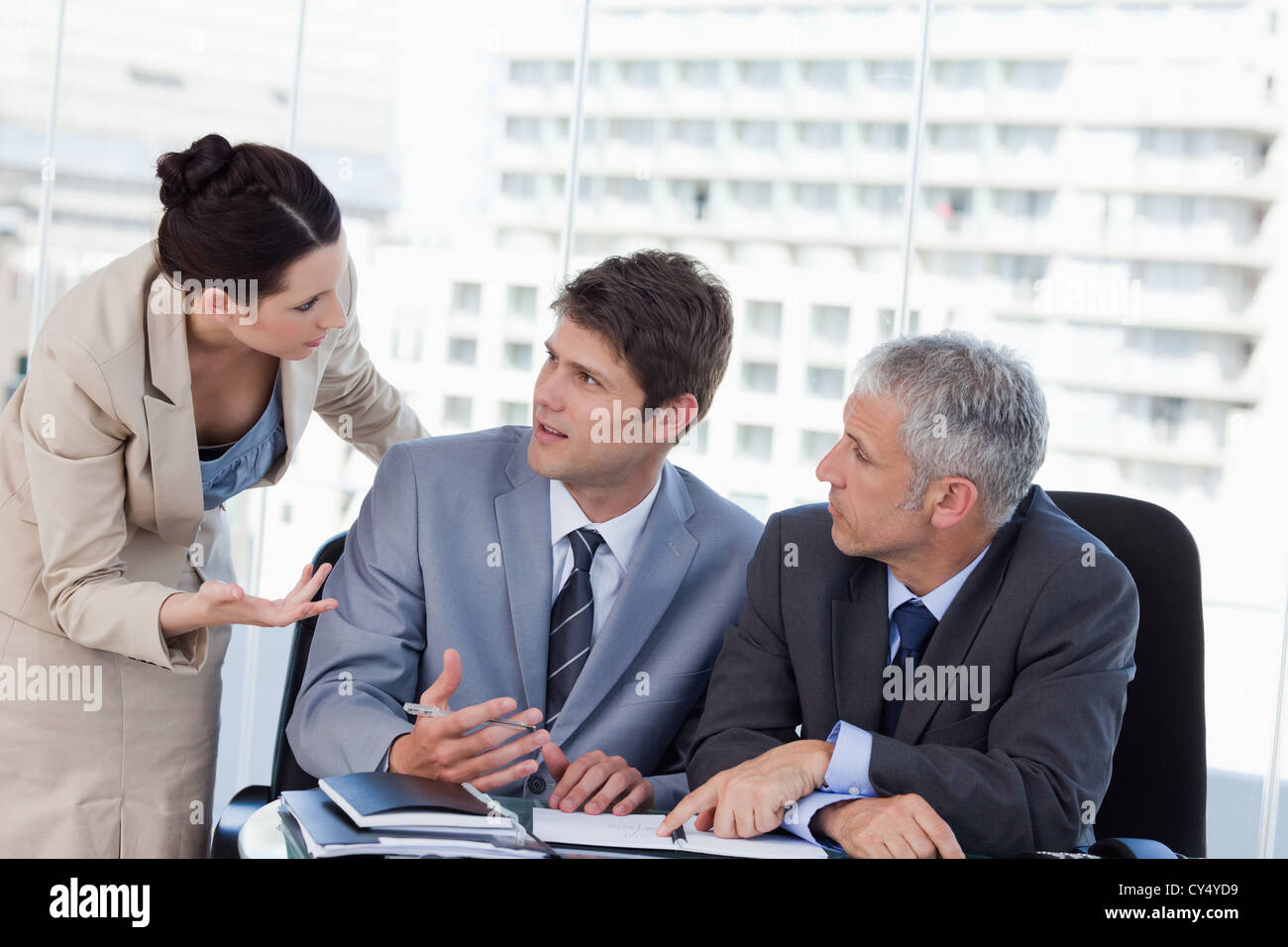 Professional business team working together Stock Photo - Alamy