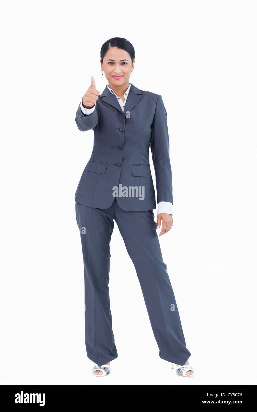 Standing businesswoman giving approval Stock Photo - Alamy