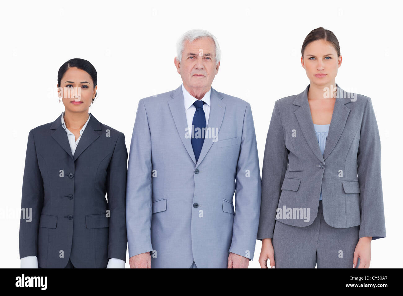 Three business people standing Stock Photo - Alamy