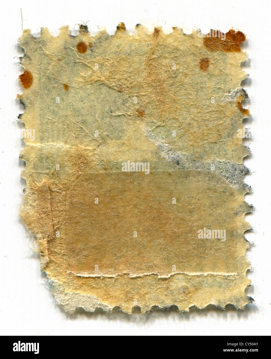 The reverse side of a postage stamp Stock Photo - Alamy