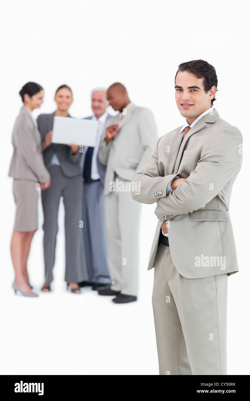 Tradesman with arms folded and team behind him Stock Photo - Alamy Tradesman with arms folded and team behind him Stock Photo - Alamy
