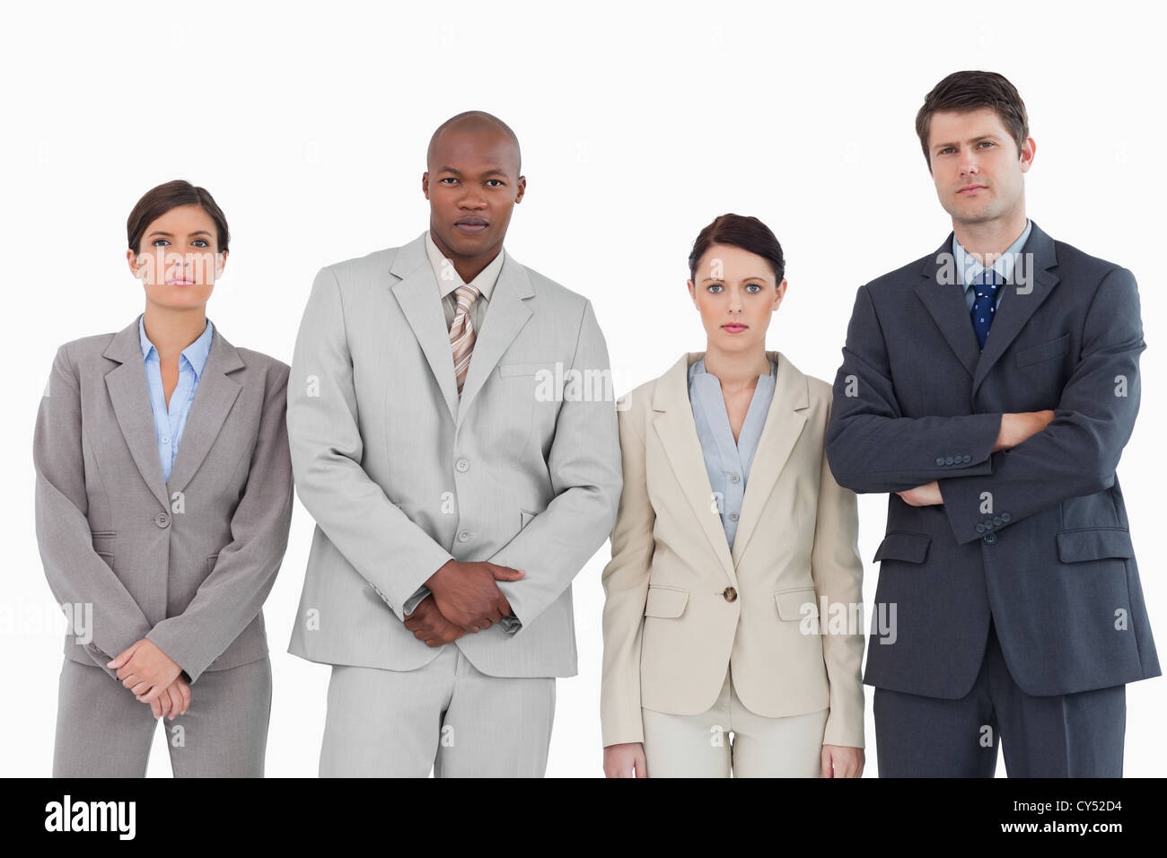 Four business people standing together Stock Photo - Alamy