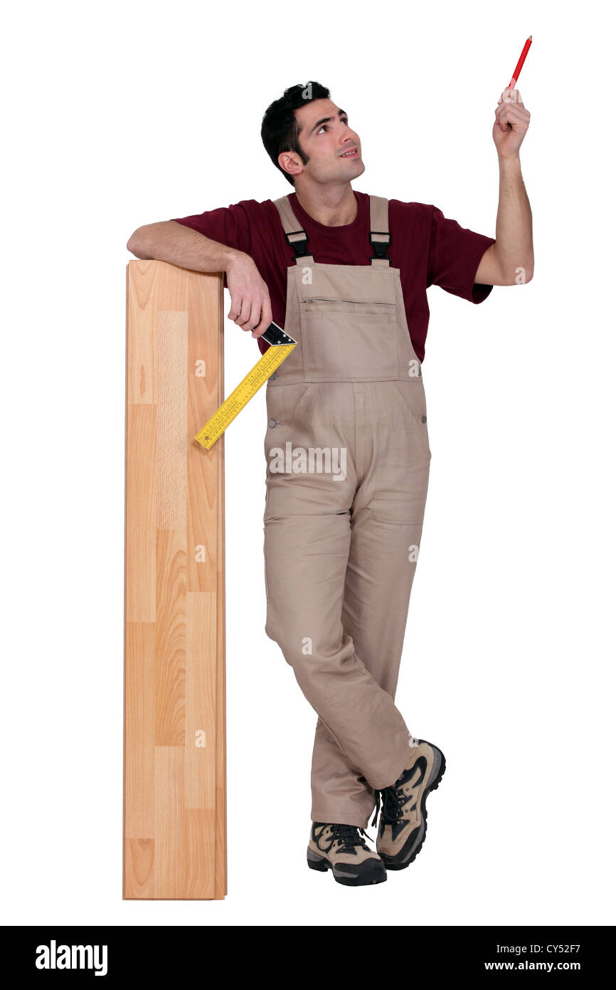 portrait of carpenter with parquet looking upwards Stock Photo - Alamy