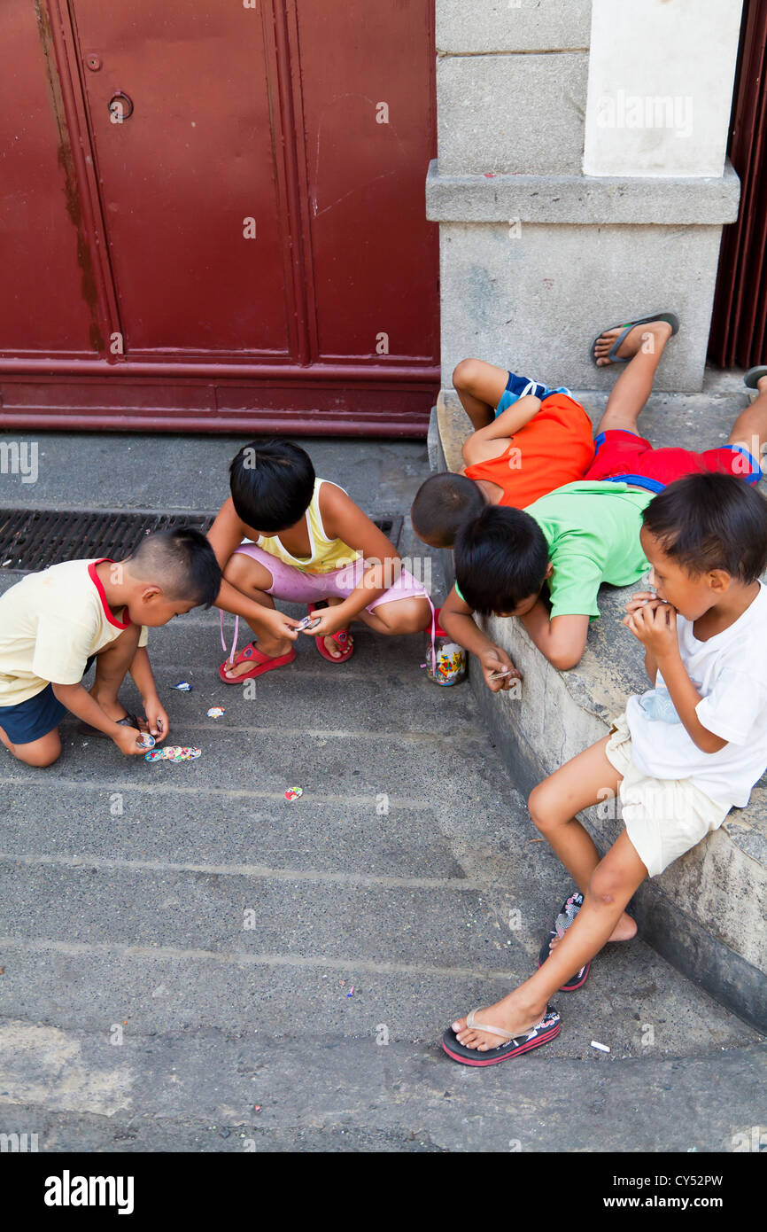 Children playing in the Streets of Manila, Philippines Stock Photo - Alamy