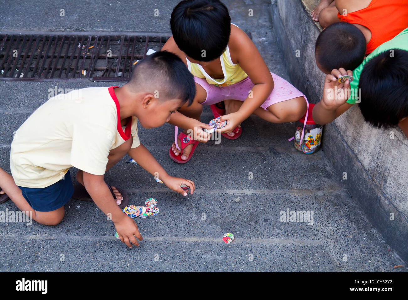 Children playing in the Streets of Manila, Philippines Stock Photo - Alamy