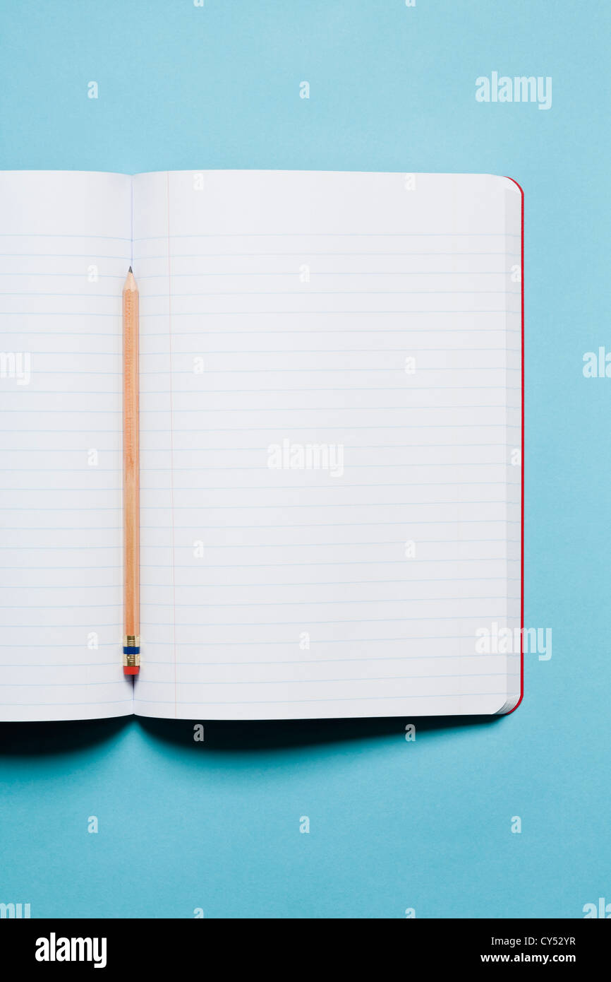 Singlewooden sharpened pencil with blank composition notebook Stock ...