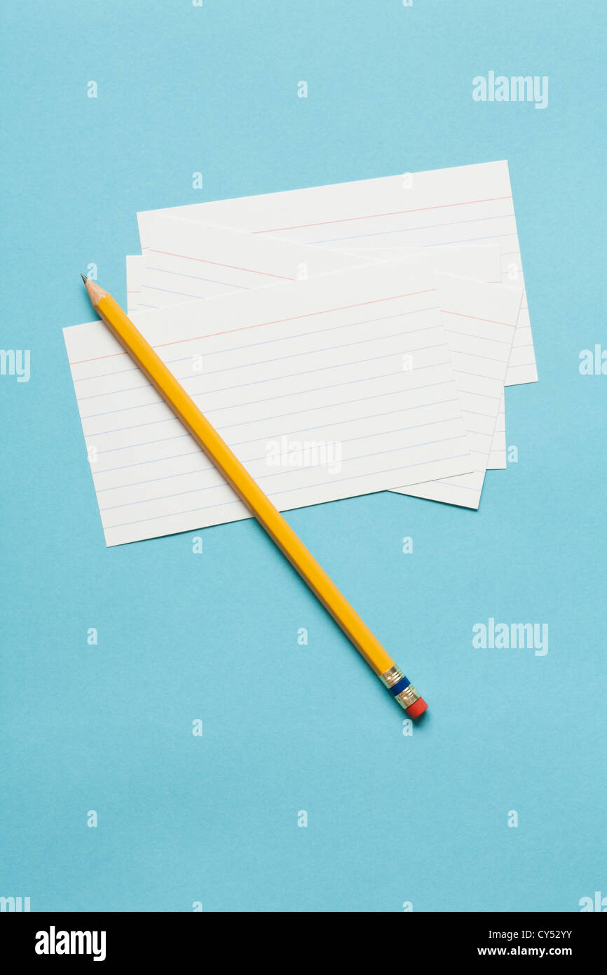 Single yellow sharpened pencil with blank note cards Stock Photo - Alamy