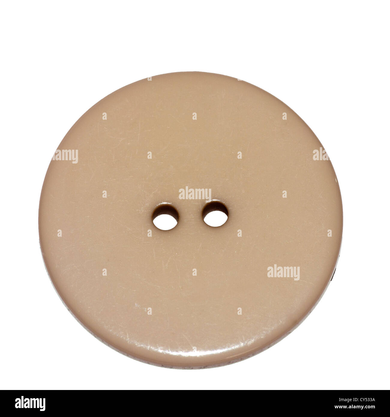 Beige Plastic Clothes Button With 2 Holes Stock Photo - Alamy