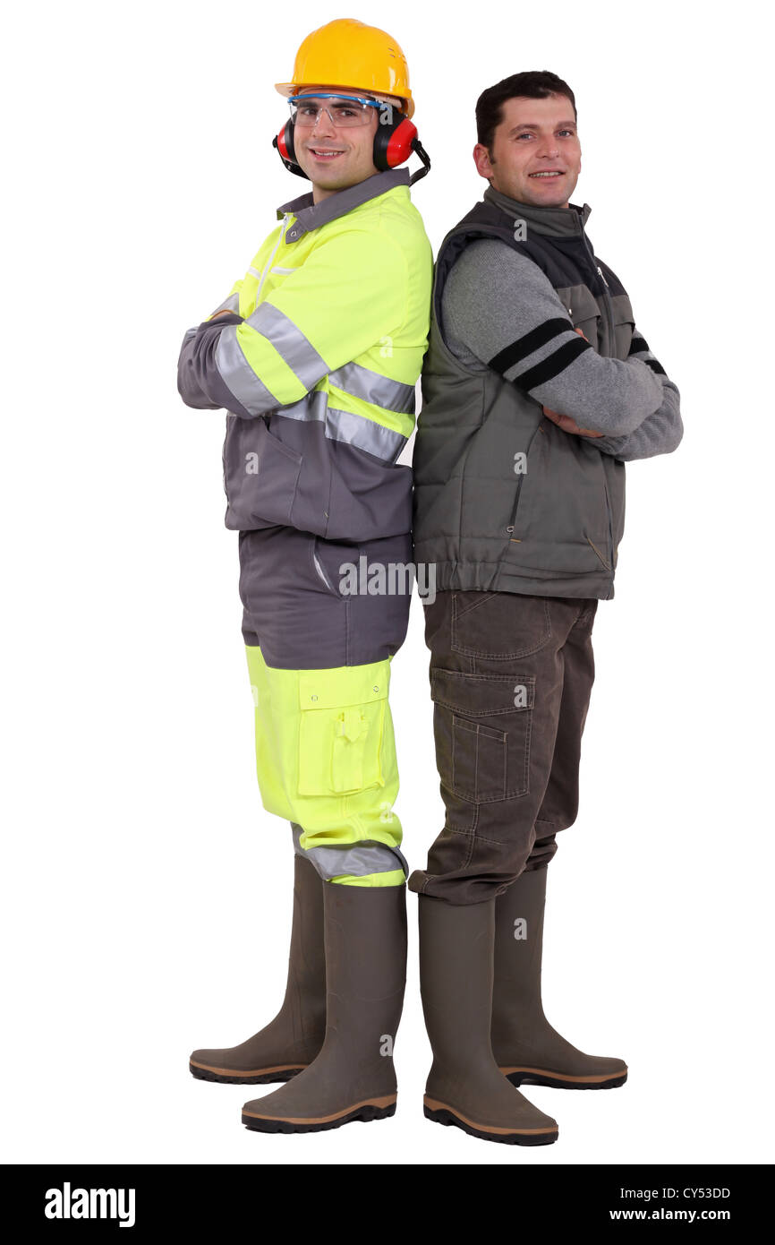 Two manual workers Stock Photo - Alamy