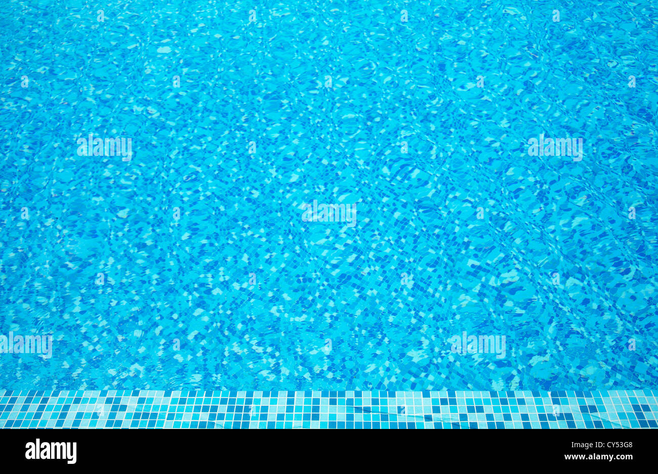 Part of swimming pool with blue clear water Stock Photo - Alamy