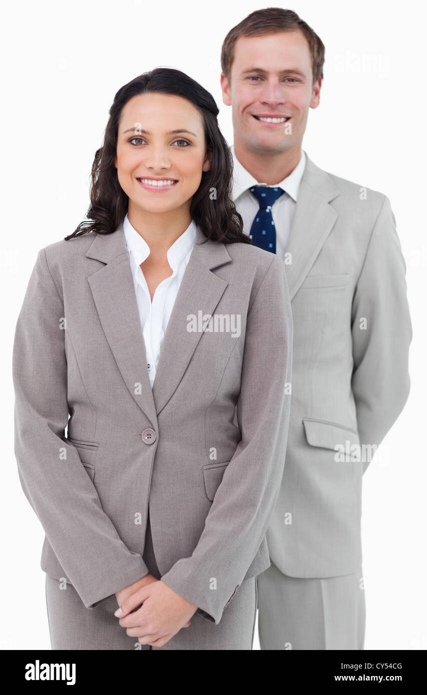 Smiling office staff standing together Stock Photo - Alamy