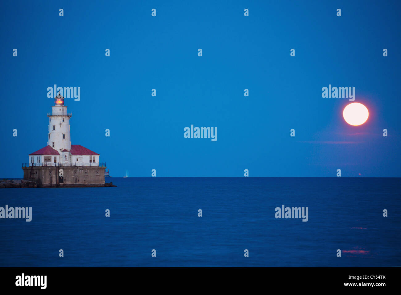 USA, Illinois, Chicago, Lake Michigan, Lighthouse and full moon Stock ...