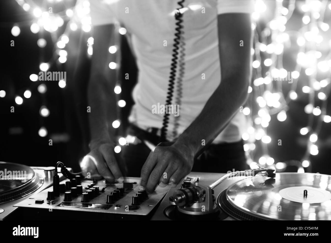 a cool male dj on the turntables Stock Photo - Alamy