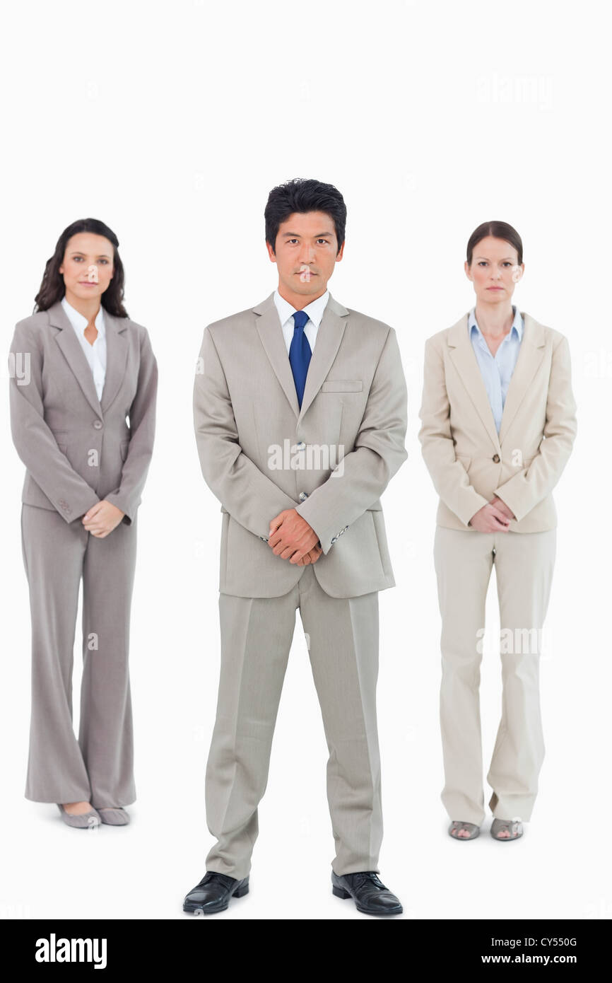 Confident looking sales team Stock Photo - Alamy