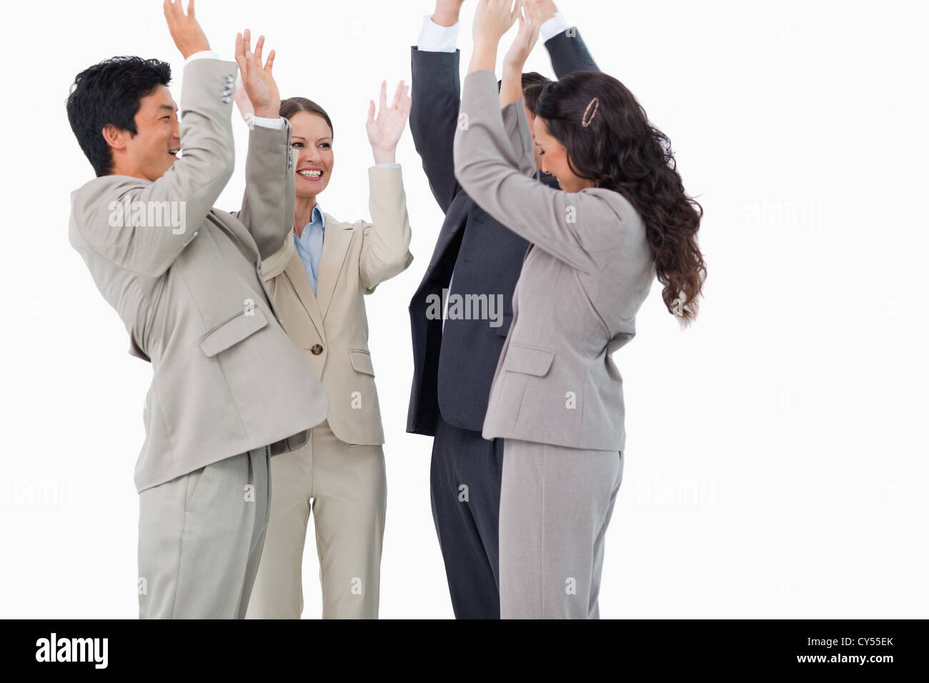 Businesspeople doing self-motivation ritual Stock Photo - Alamy