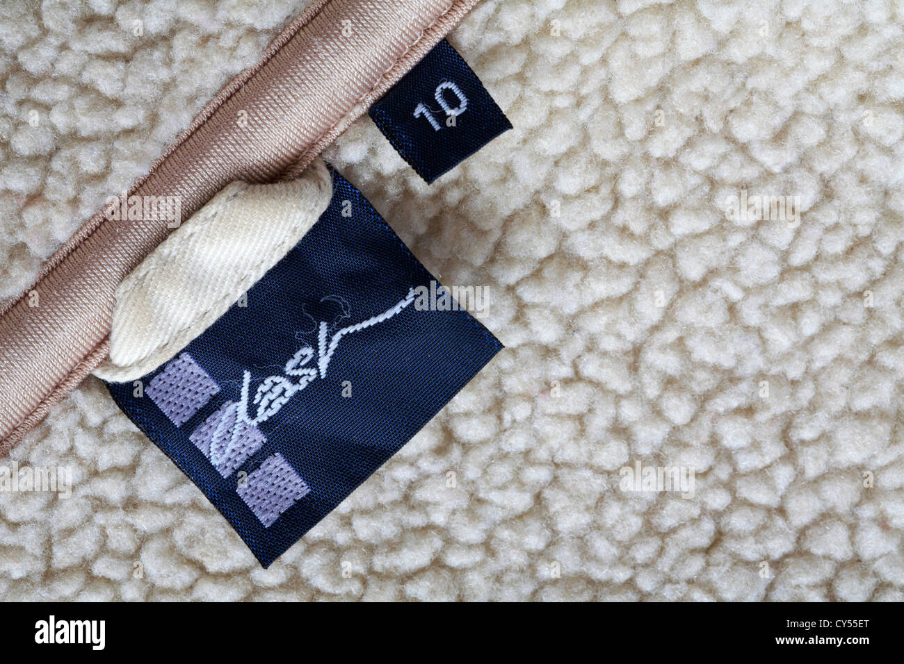 Dash label inside coat Stock Photo - Alamy