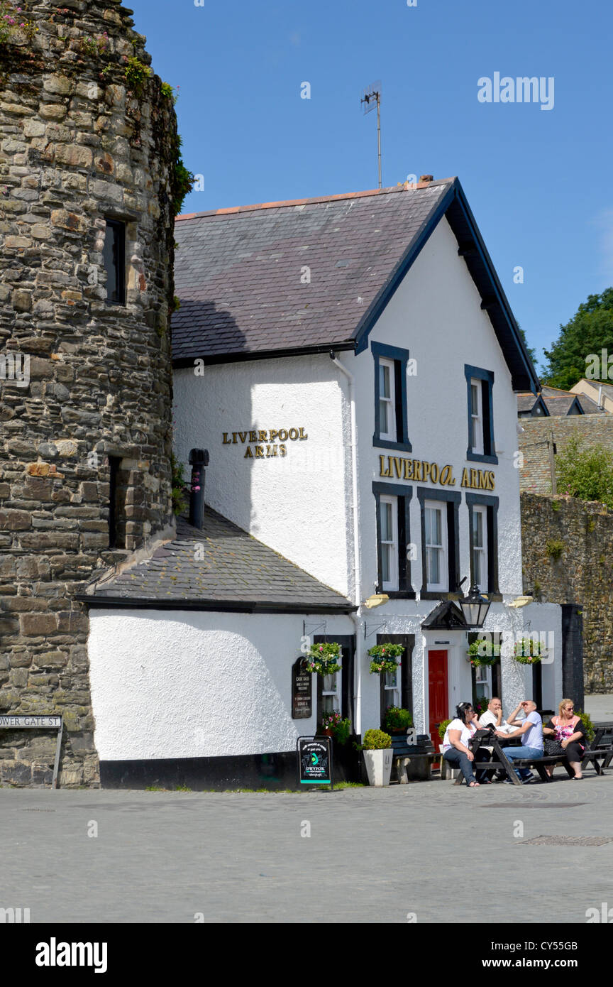 Conwy Wales people sitting outside The Liverpool Arms quayside pub ...