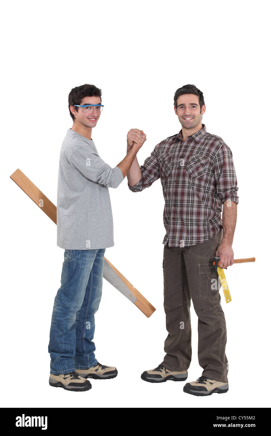 Construction workers collaborating Stock Photo - Alamy