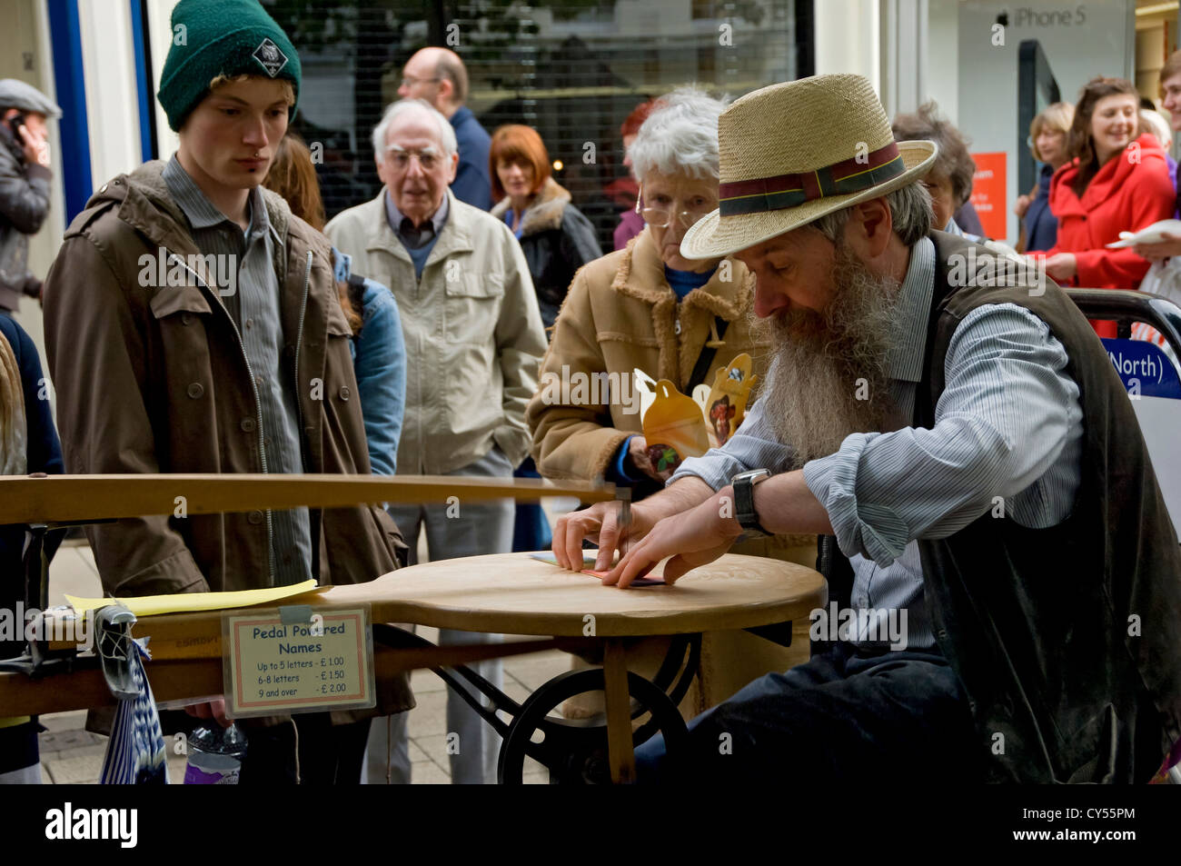 Man person making wooden name plaques sign signs York North Yorkshire ...
