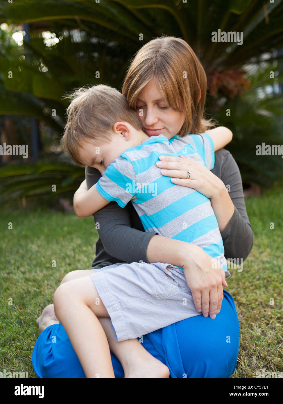 USA, California, Los Angeles, Mother hugging her son Stock Photo - Alamy