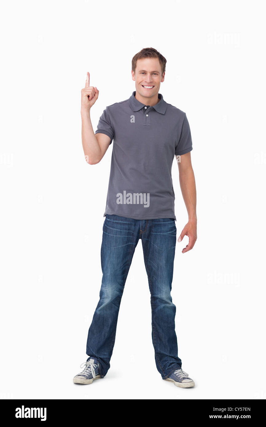 Casual young man pointing camera Cut Out Stock Images & Pictures - Alamy