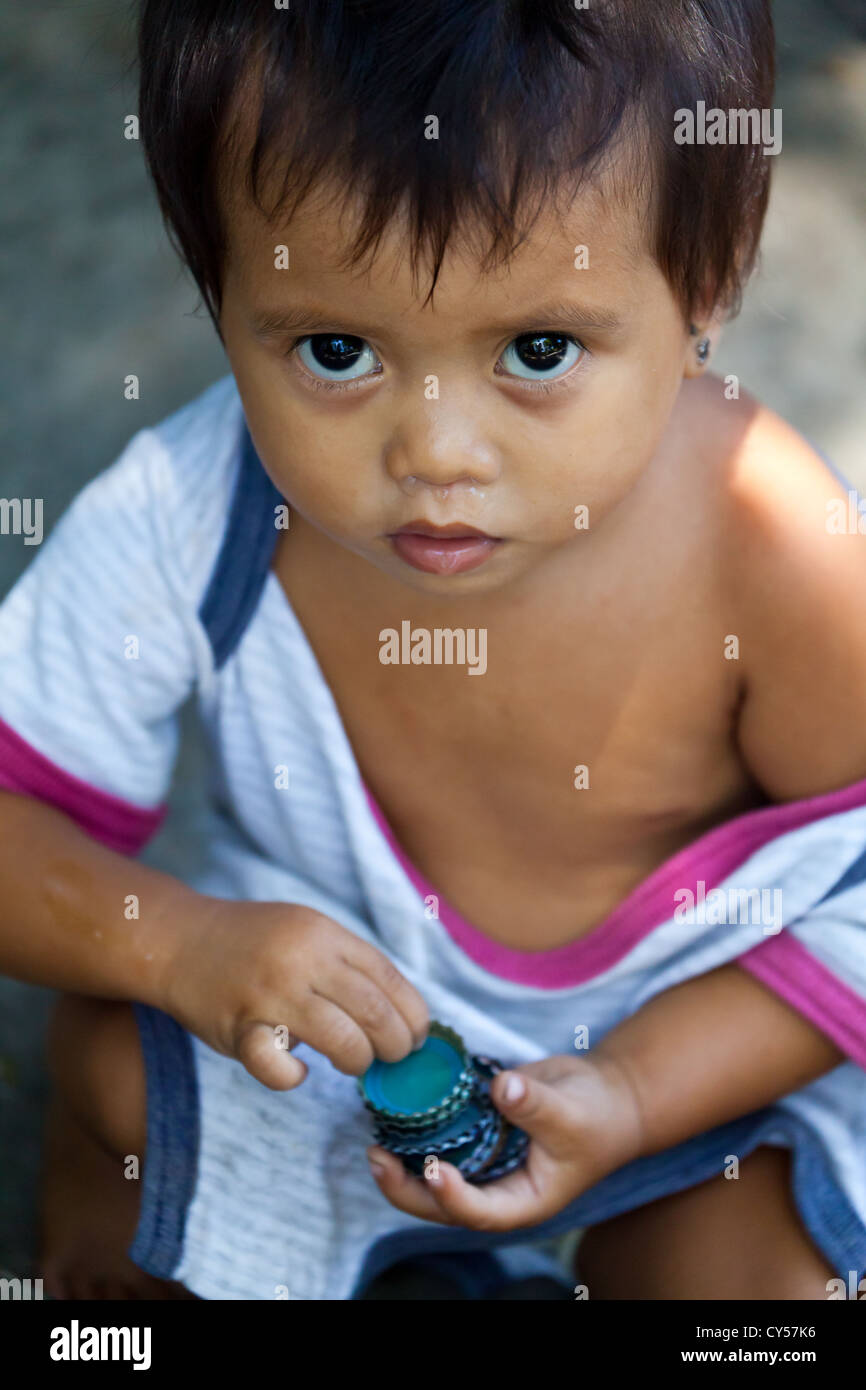 Cute little Girl in the Old Town of Manila, Philippines Stock Photo - Alamy