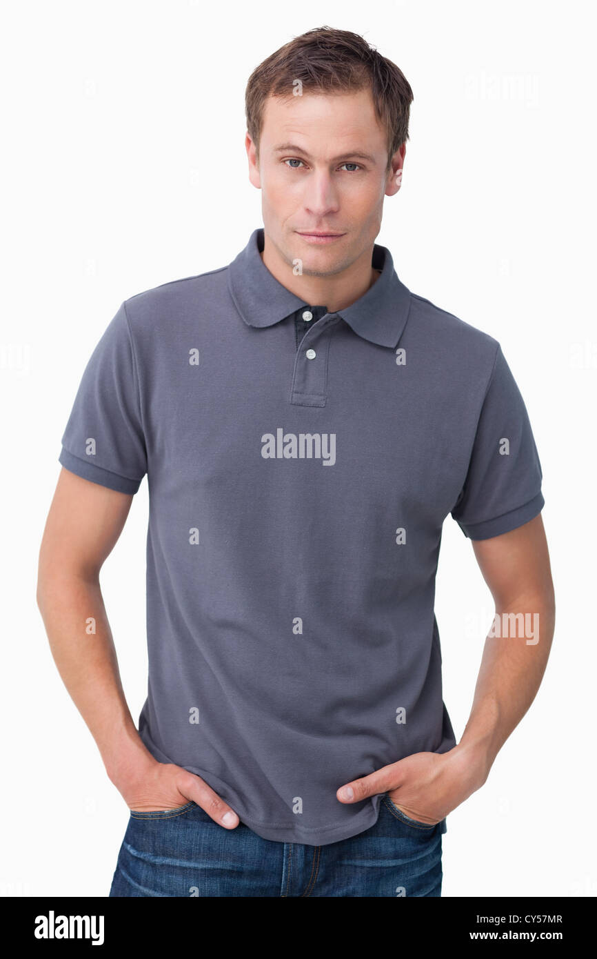 Young male with hands in his pockets Stock Photo - Alamy