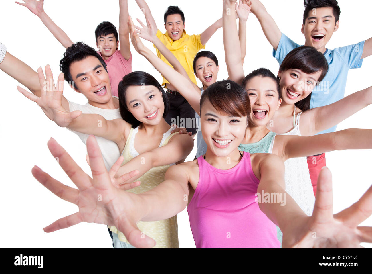 Young people stretching out hands Stock Photo - Alamy
