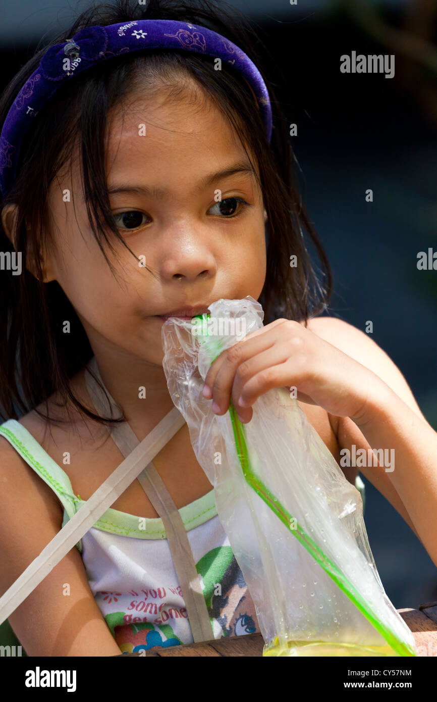 Cute little Girl in the Old Town of Manila, Philippines Stock Photo - Alamy