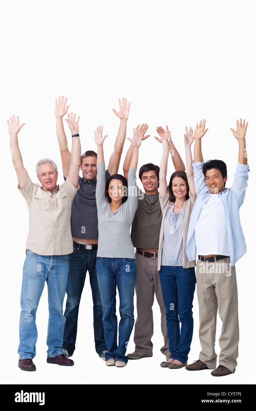 Celebrating cheering smiling arms raised group team Cut Out Stock ...