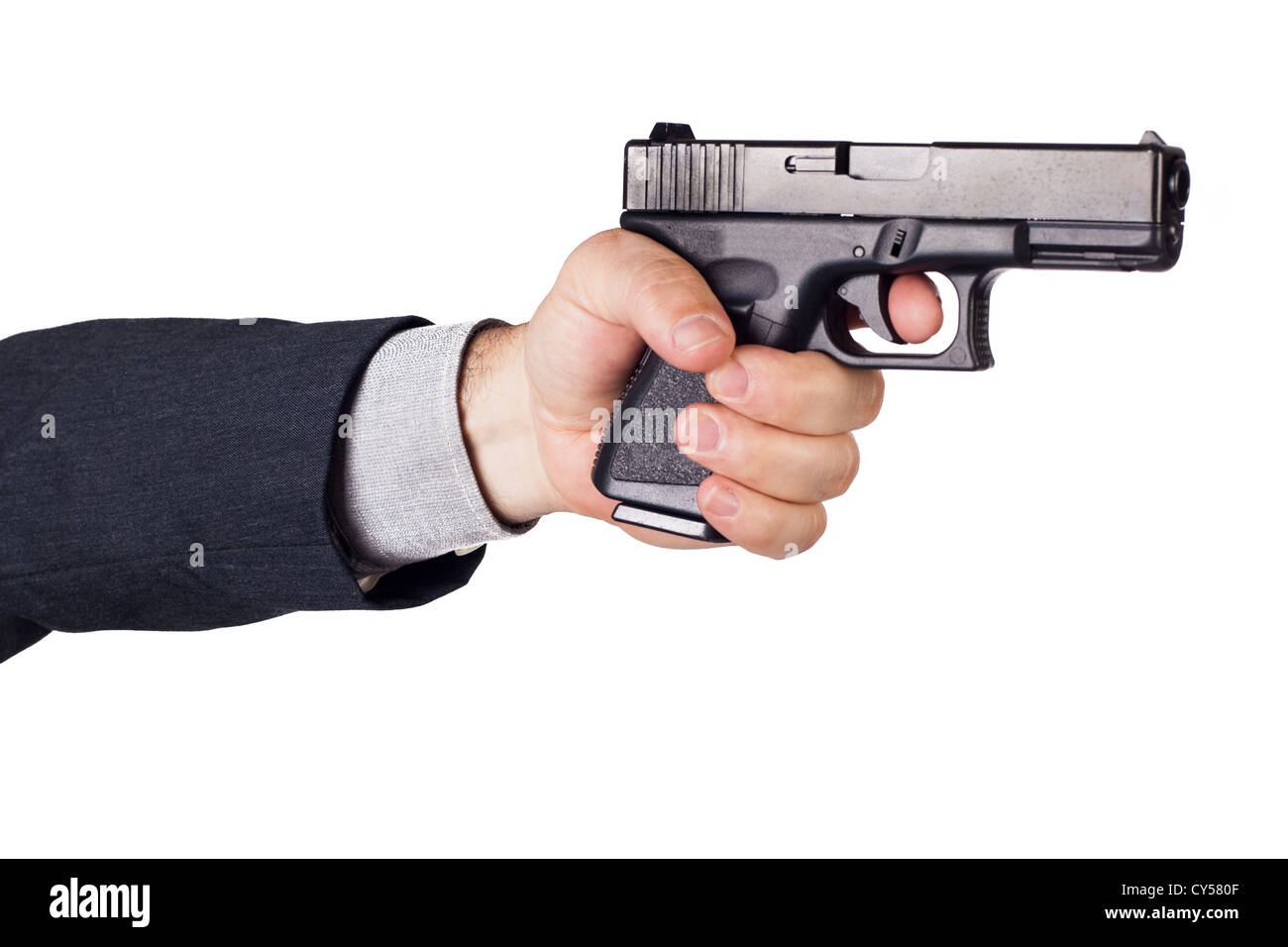 Hand with gun ready to shoot Stock Photo - Alamy