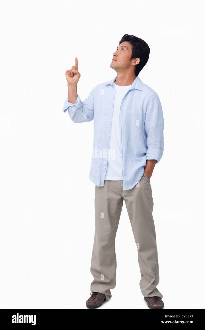 Male pointing and looking up Stock Photo - Alamy