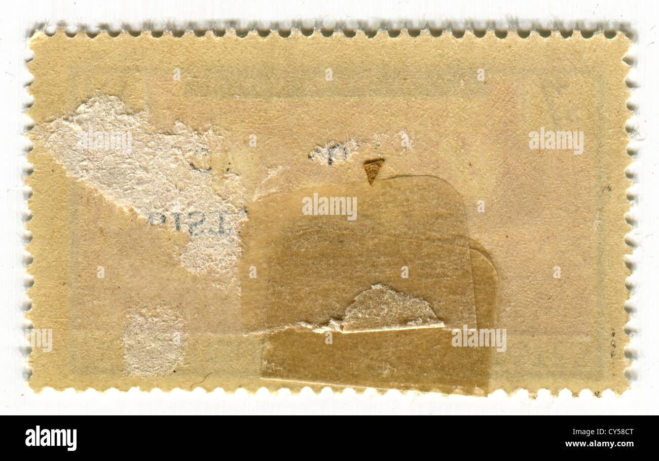 The reverse side of a postage stamp Stock Photo - Alamy