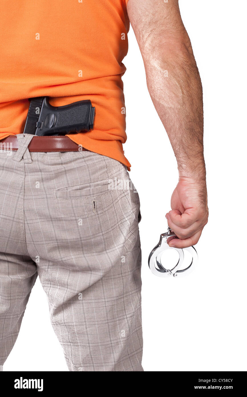 Men with a gun and handcuffs, isolated on white background Stock Photo ...