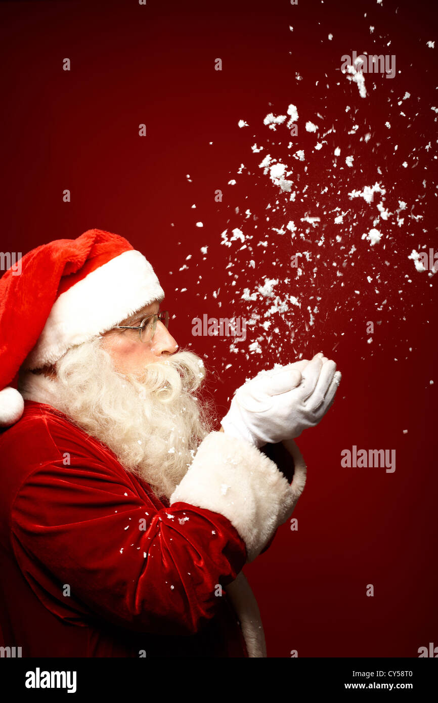 Santa claus blowing wind hi-res stock photography and images - Alamy