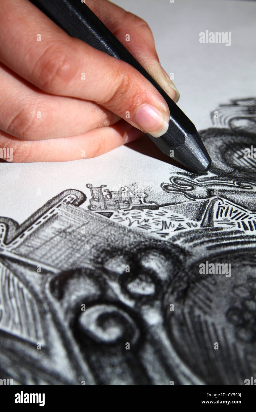 Artist at work sketching Stock Photo - Alamy