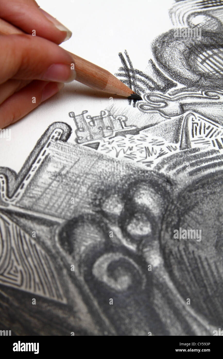 Artist at work sketching Stock Photo - Alamy