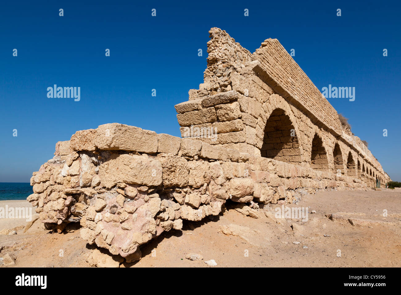 Ancient aqueduct on the beach at Caesarea, Israel Stock Photo - Alamy