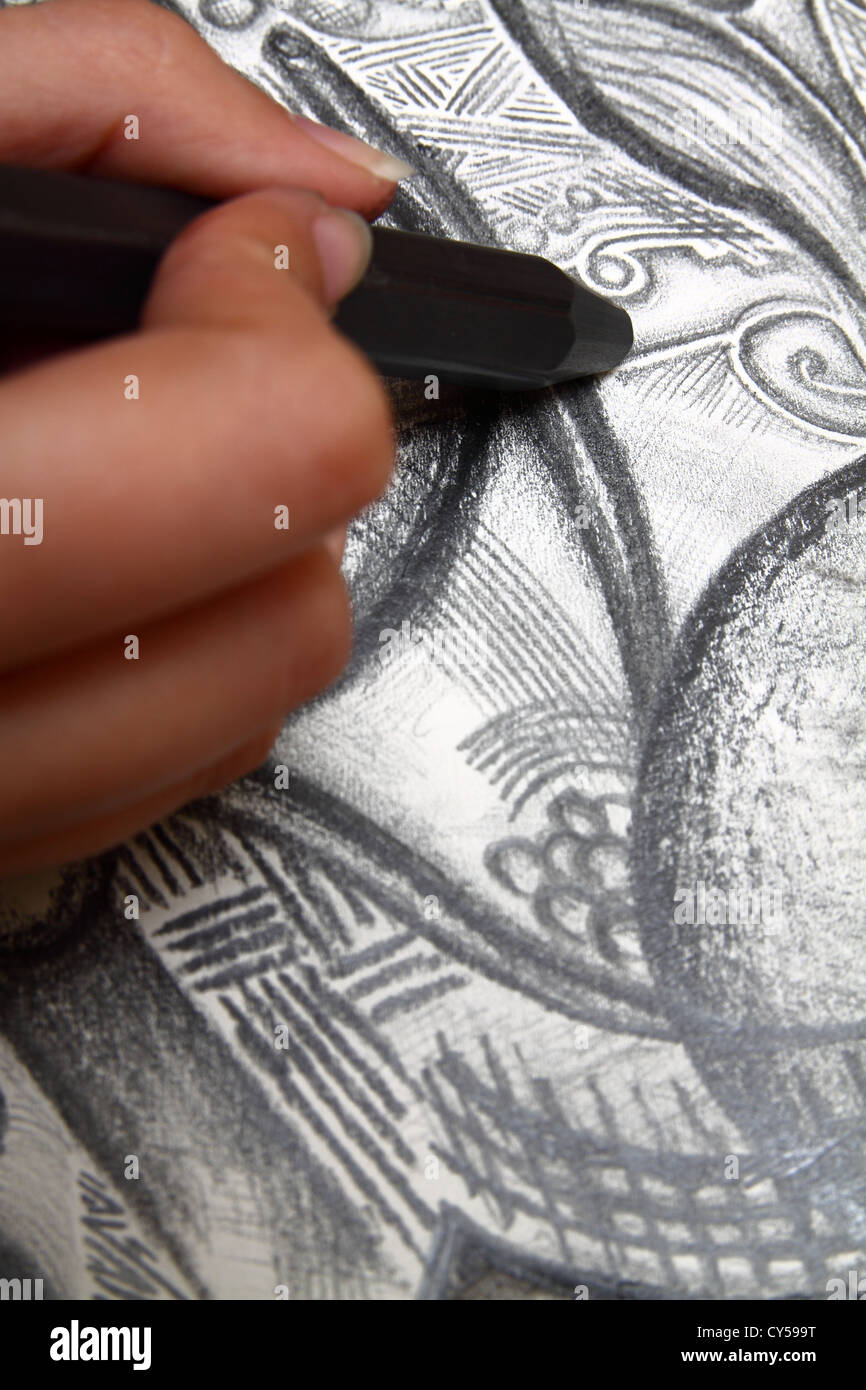 Artist at work sketching Stock Photo - Alamy