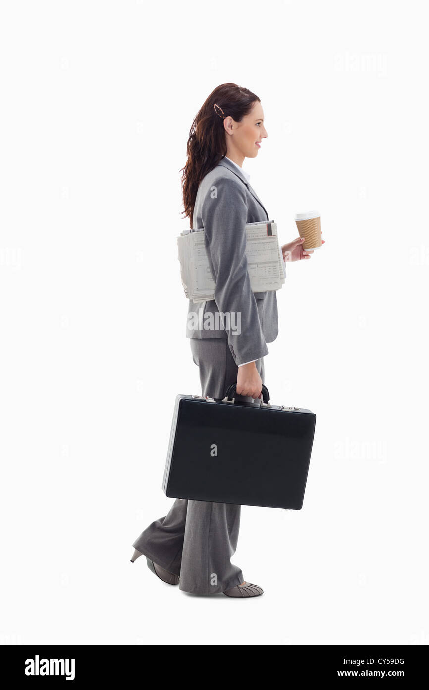 Businesswoman walking to work Stock Photo - Alamy
