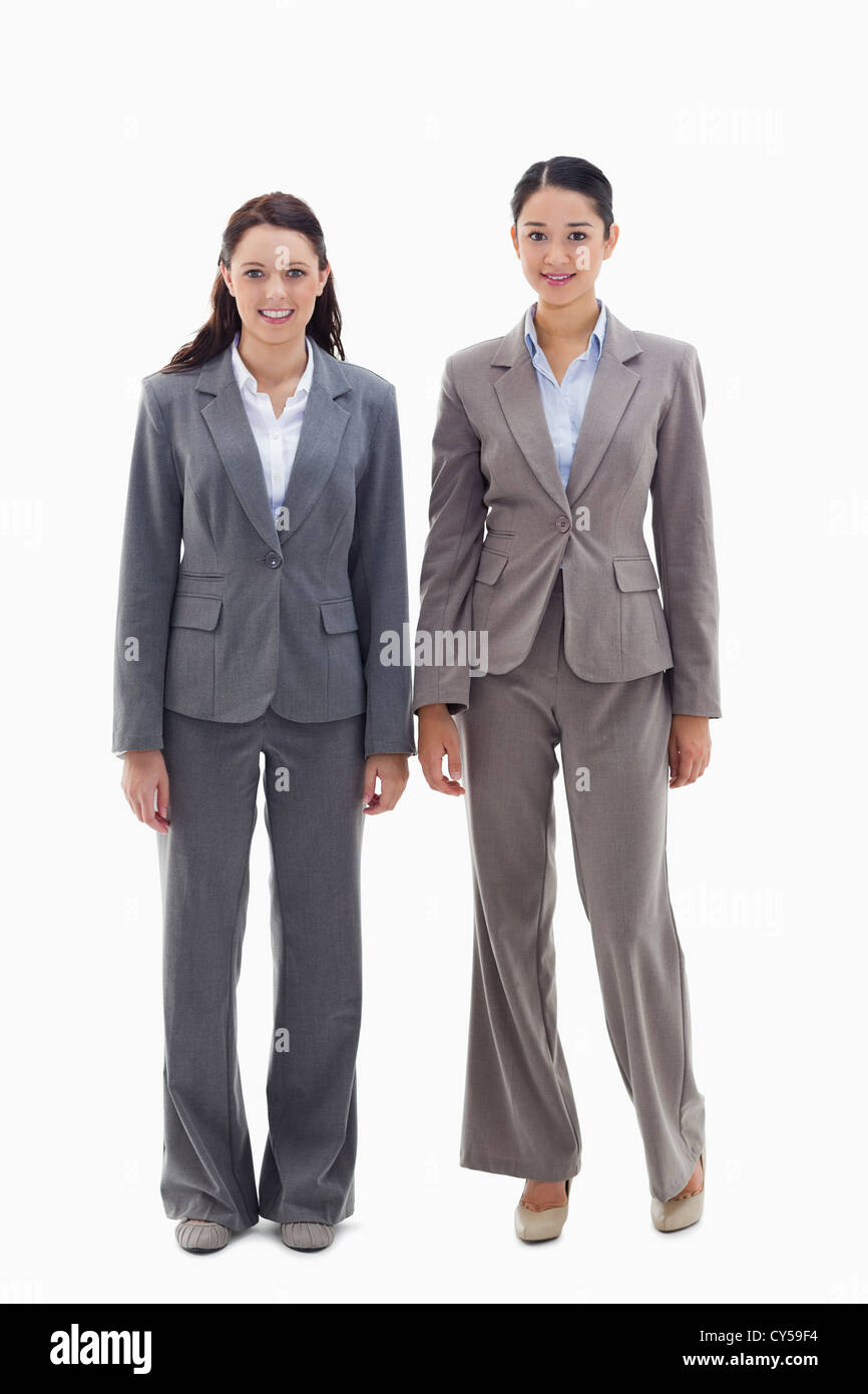 Two businesswomen smiling Stock Photo - Alamy